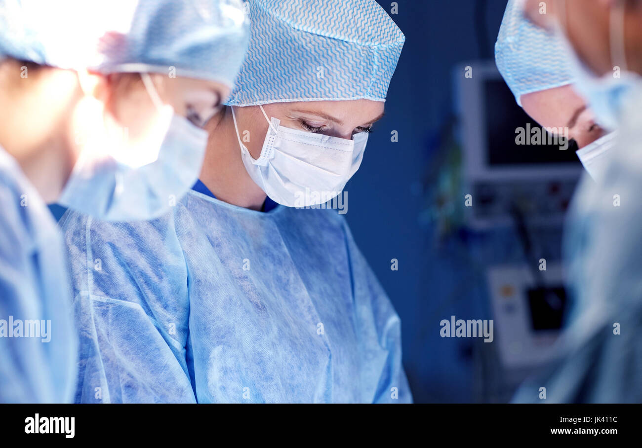 group of surgeons in operating room at hospital Stock Photo - Alamy
