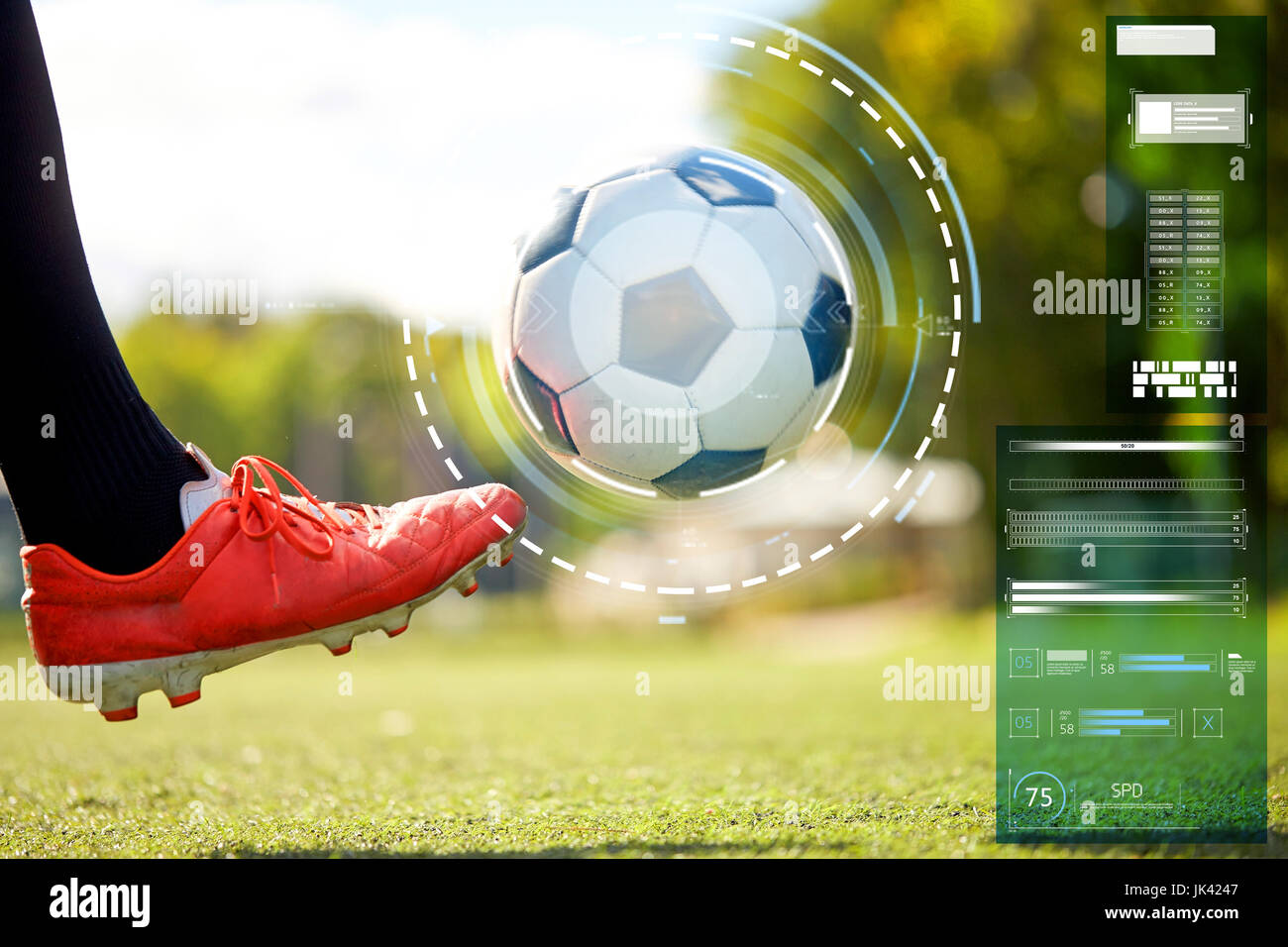 soccer player playing with ball on football field Stock Photo - Alamy