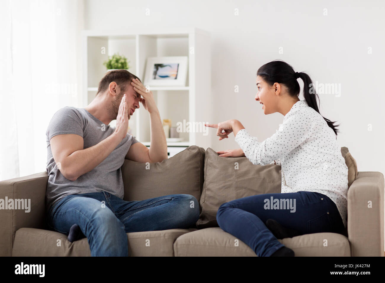 unhappy couple having argument at home Stock Photo - Alamy
