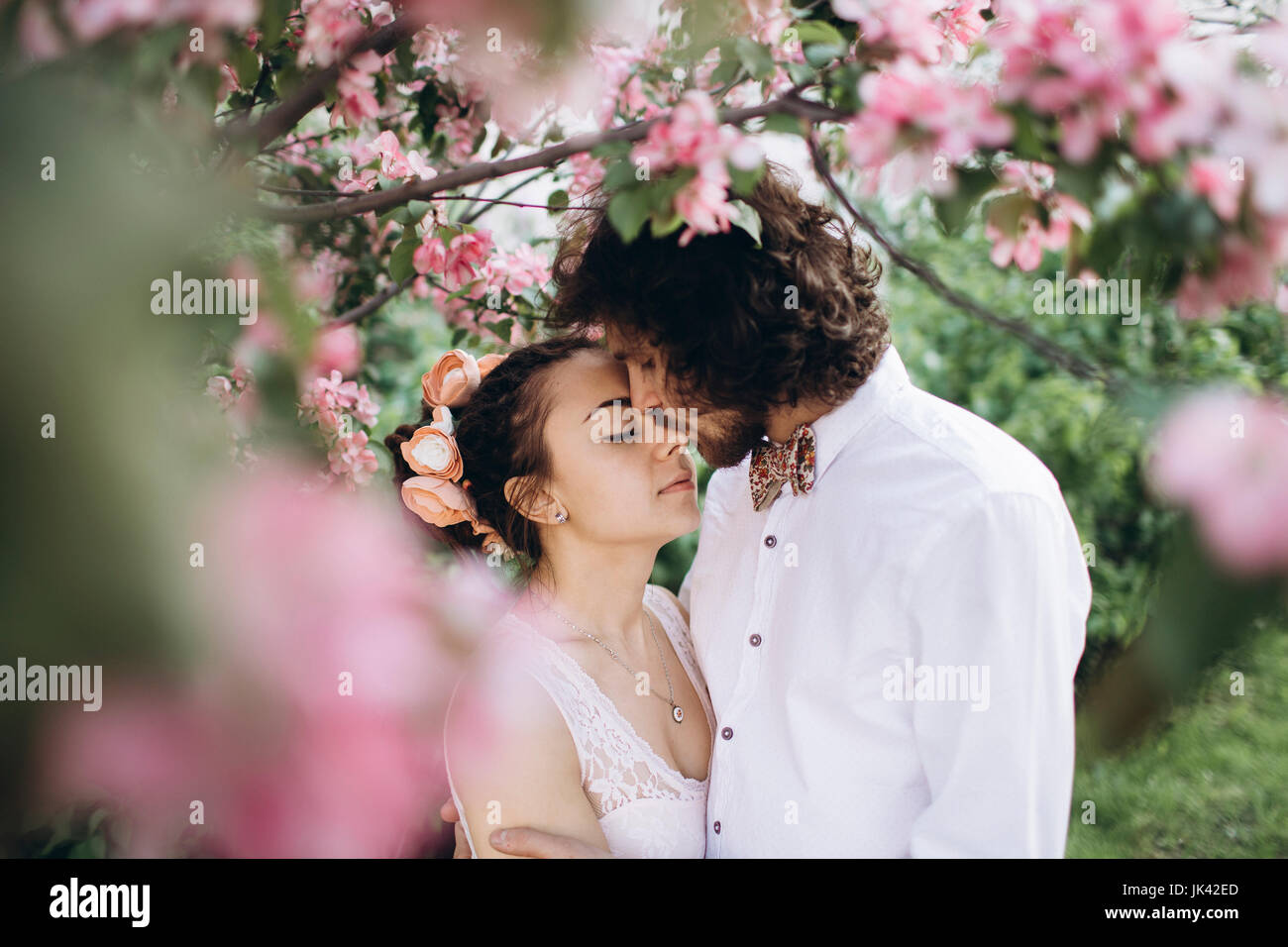 Men kissing the bride hi-res stock photography and images - Alamy