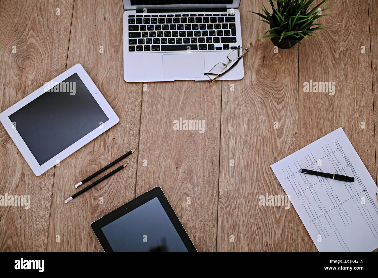Office workplace with a laptop and documents Stock Photo - Alamy