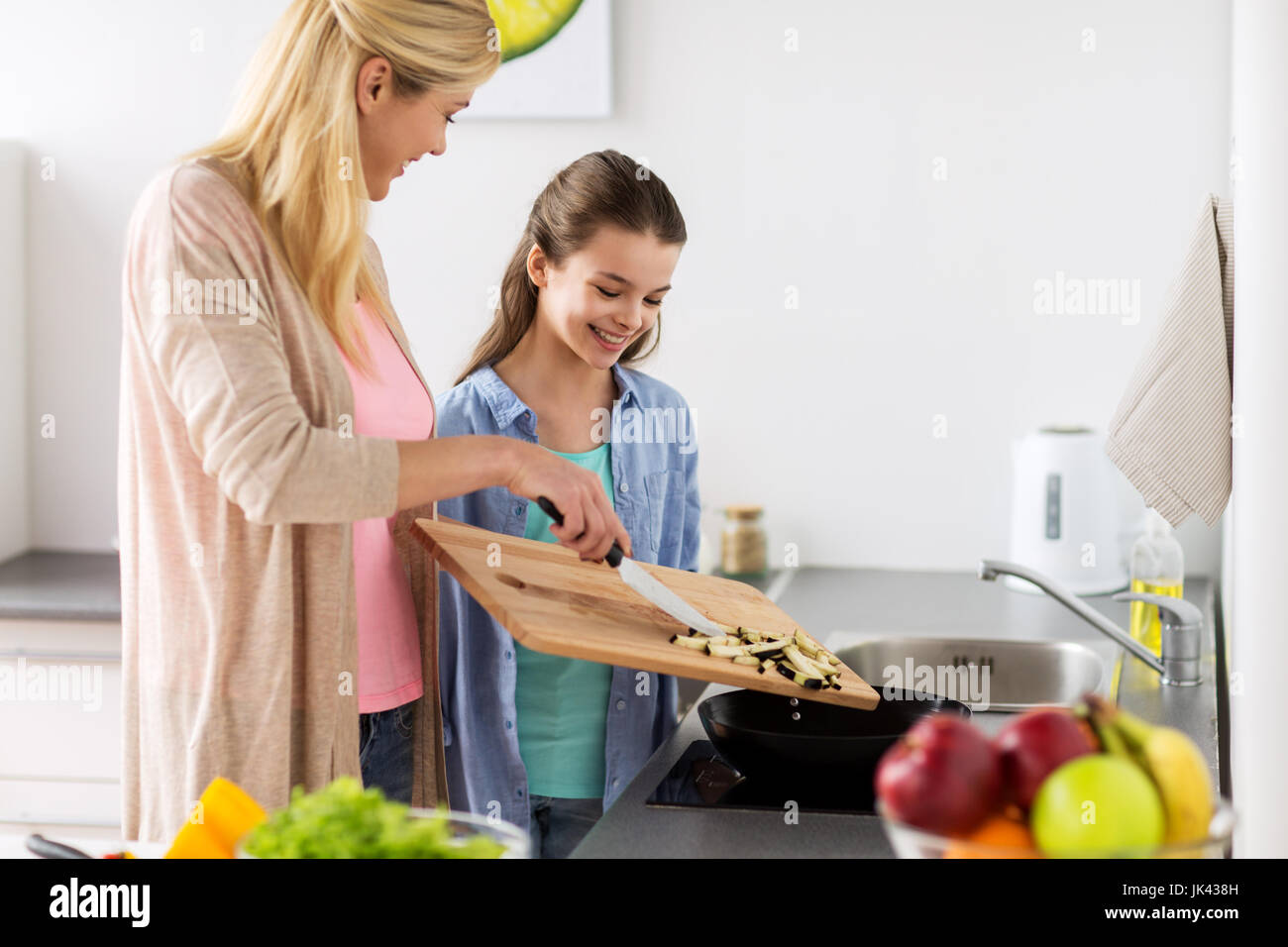 Teen girl cooking healthy food hi-res stock photography and images - Alamy