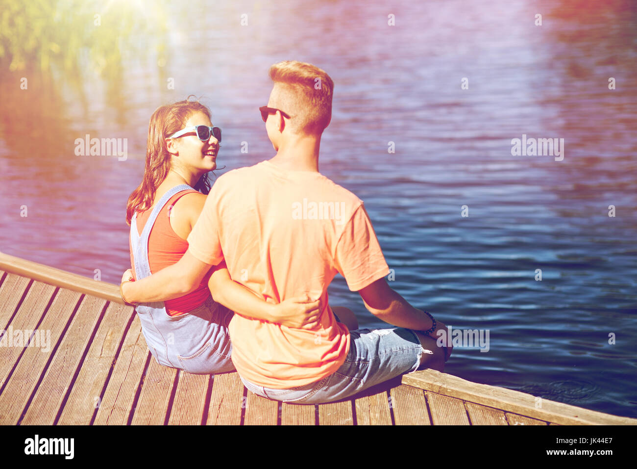 Girl boy hugging water hi-res stock photography and images - Alamy
