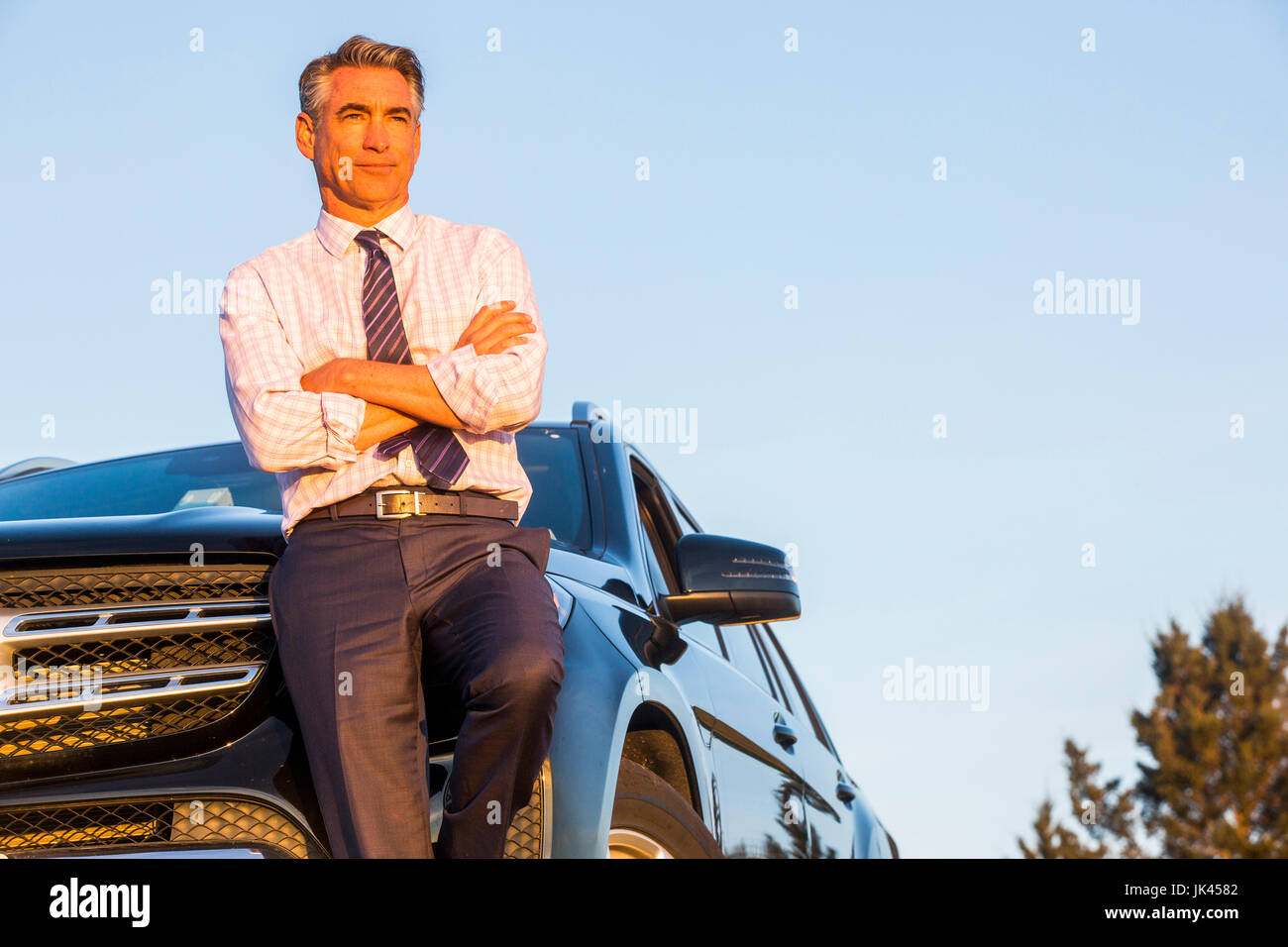 Person leaning on car hi-res stock photography and images - Alamy