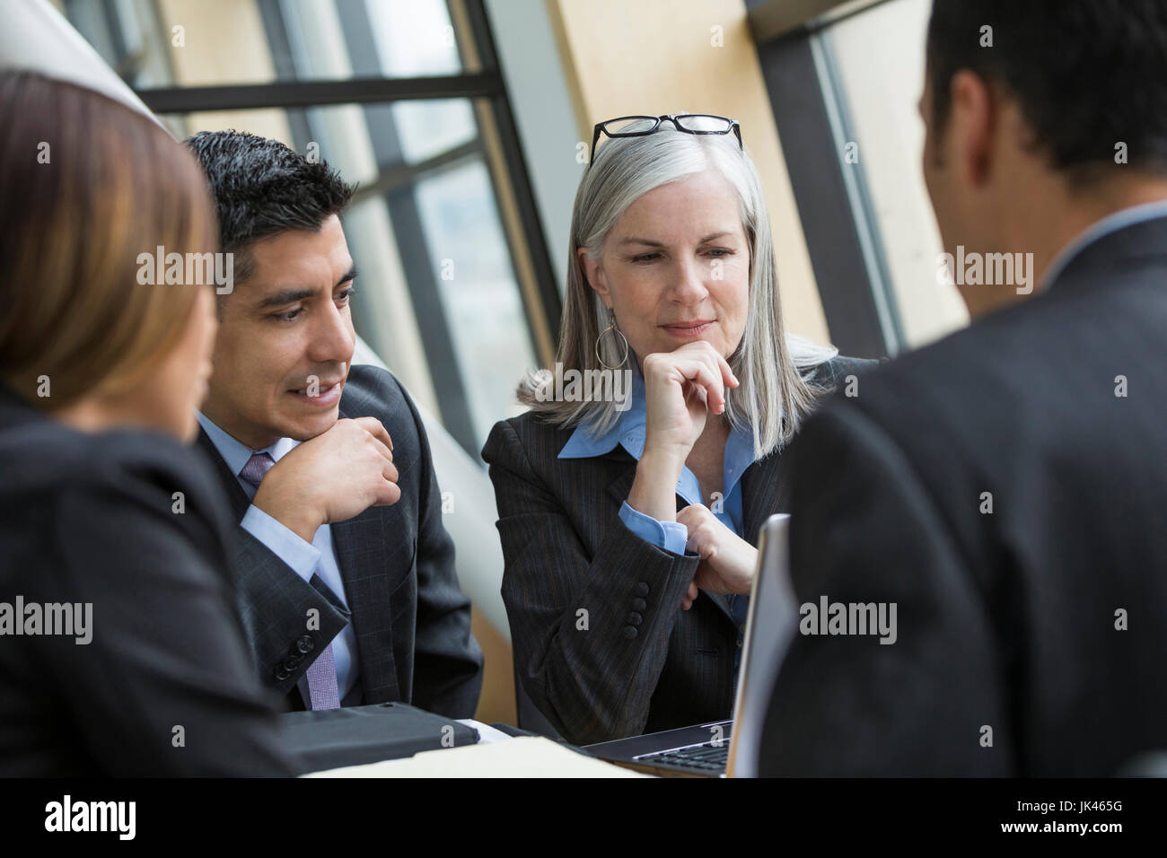 People looking over laptop hi-res stock photography and images - Alamy