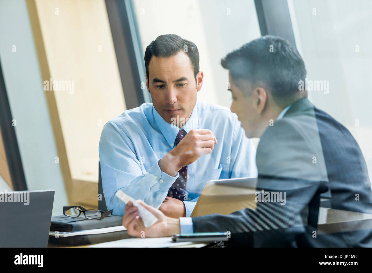 Businessmen talking in meeting Stock Photo - Alamy