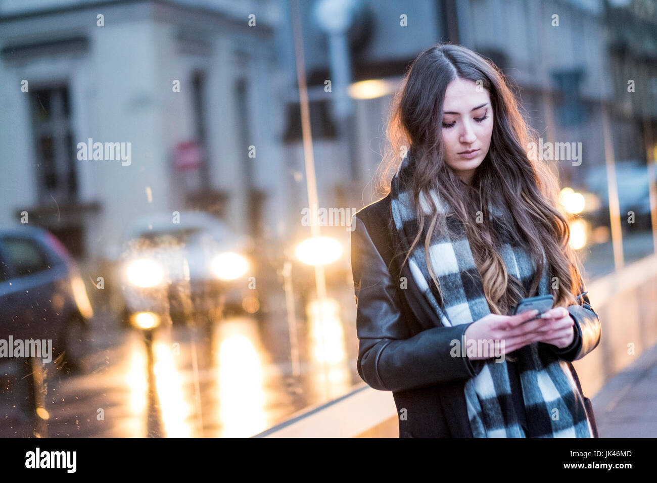 Person and texting adult serious street hi-res stock photography and ...