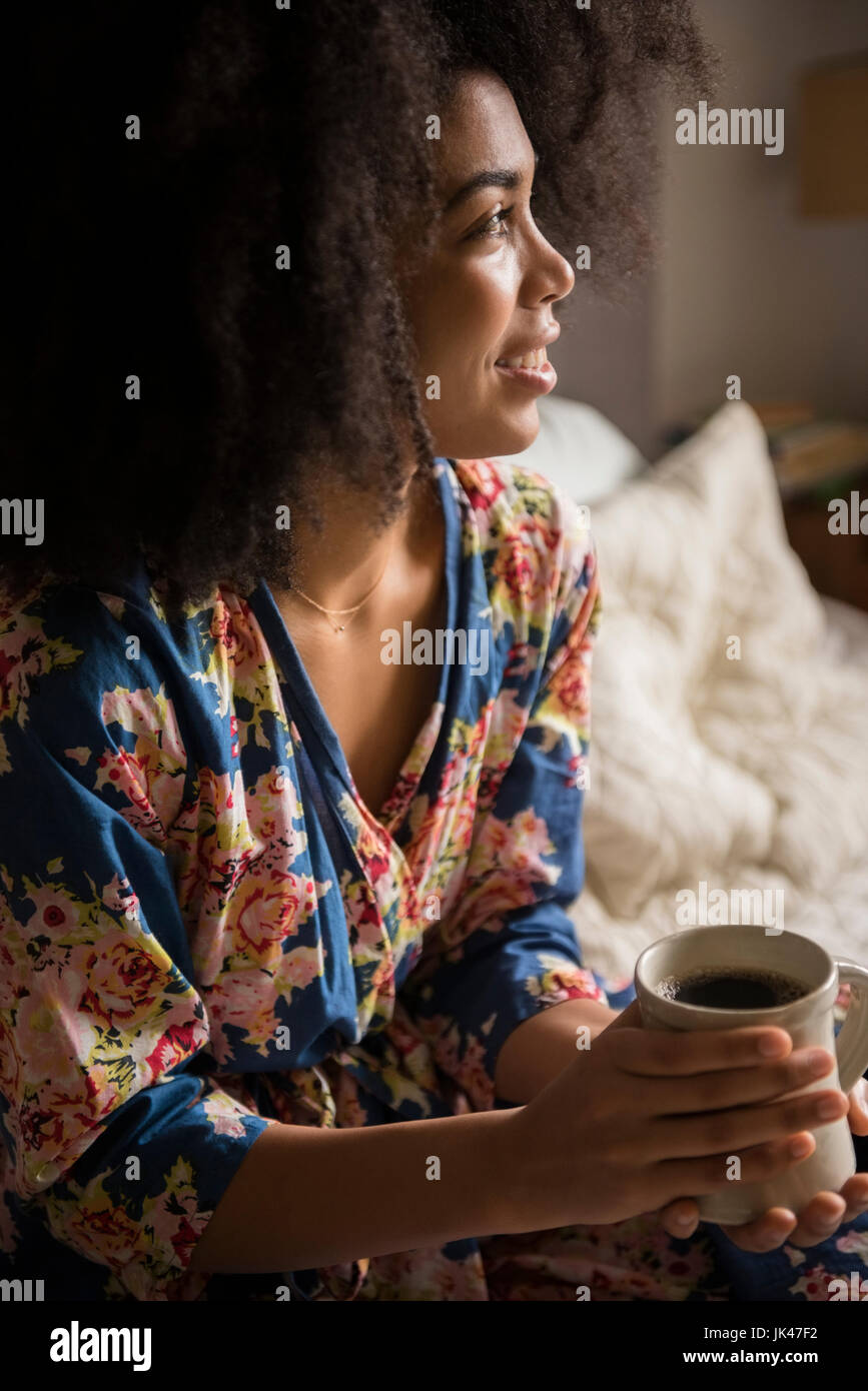 African american woman sitting in bed hi-res stock photography and ...