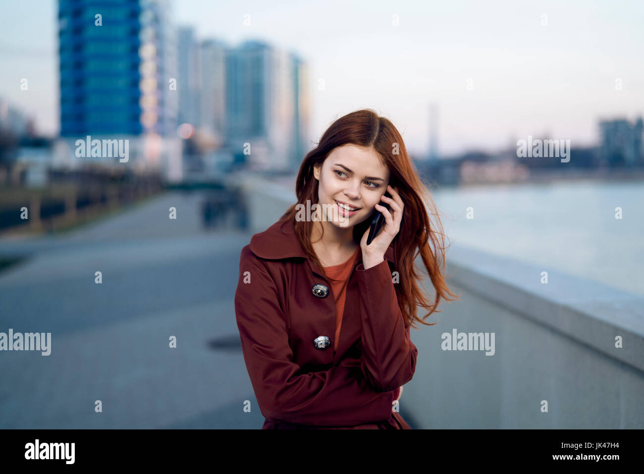Back view young woman phone talking hi-res stock photography and images ...