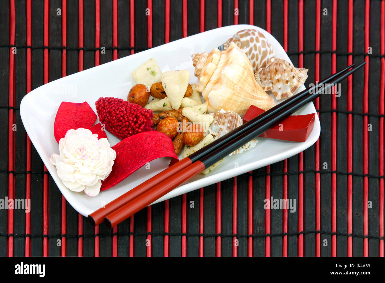 Japanese style meal plate with chopsticks on white ceramic plate Stock ...