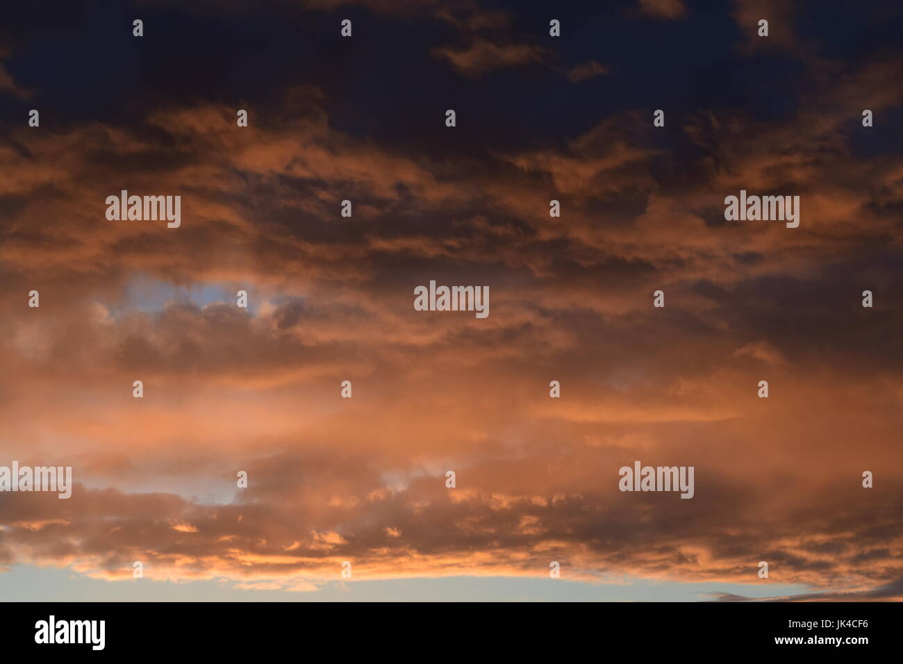 Rosy clouds at sunset Stock Photo - Alamy