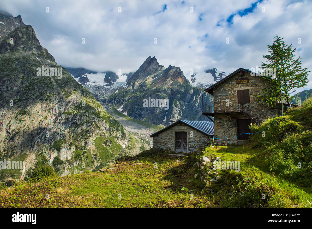 Jagged mountains of the Alps around the mountain refuge cabin Walter ...