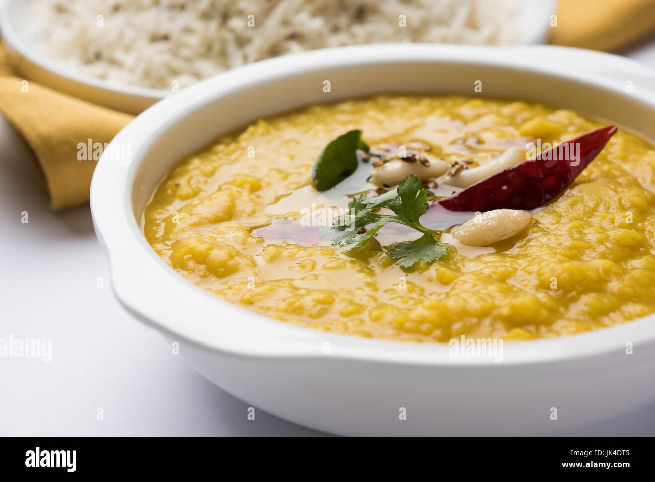 Indian popular food Dal fry or traditional Dal Tadka Curry served with ...