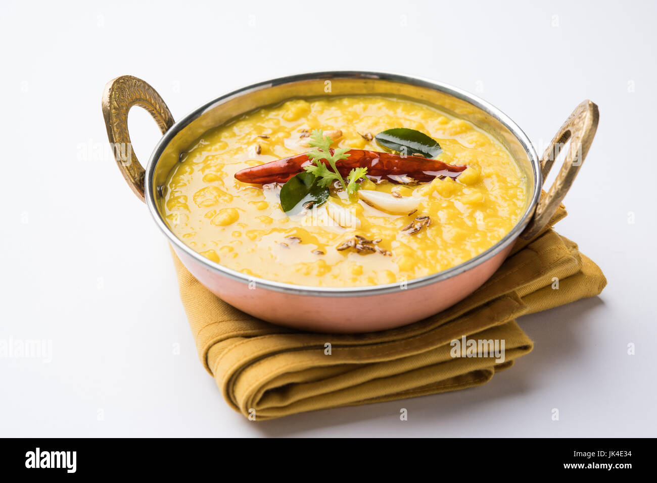 Indian popular food Dal fry or traditional Dal Tadka Curry served with ...