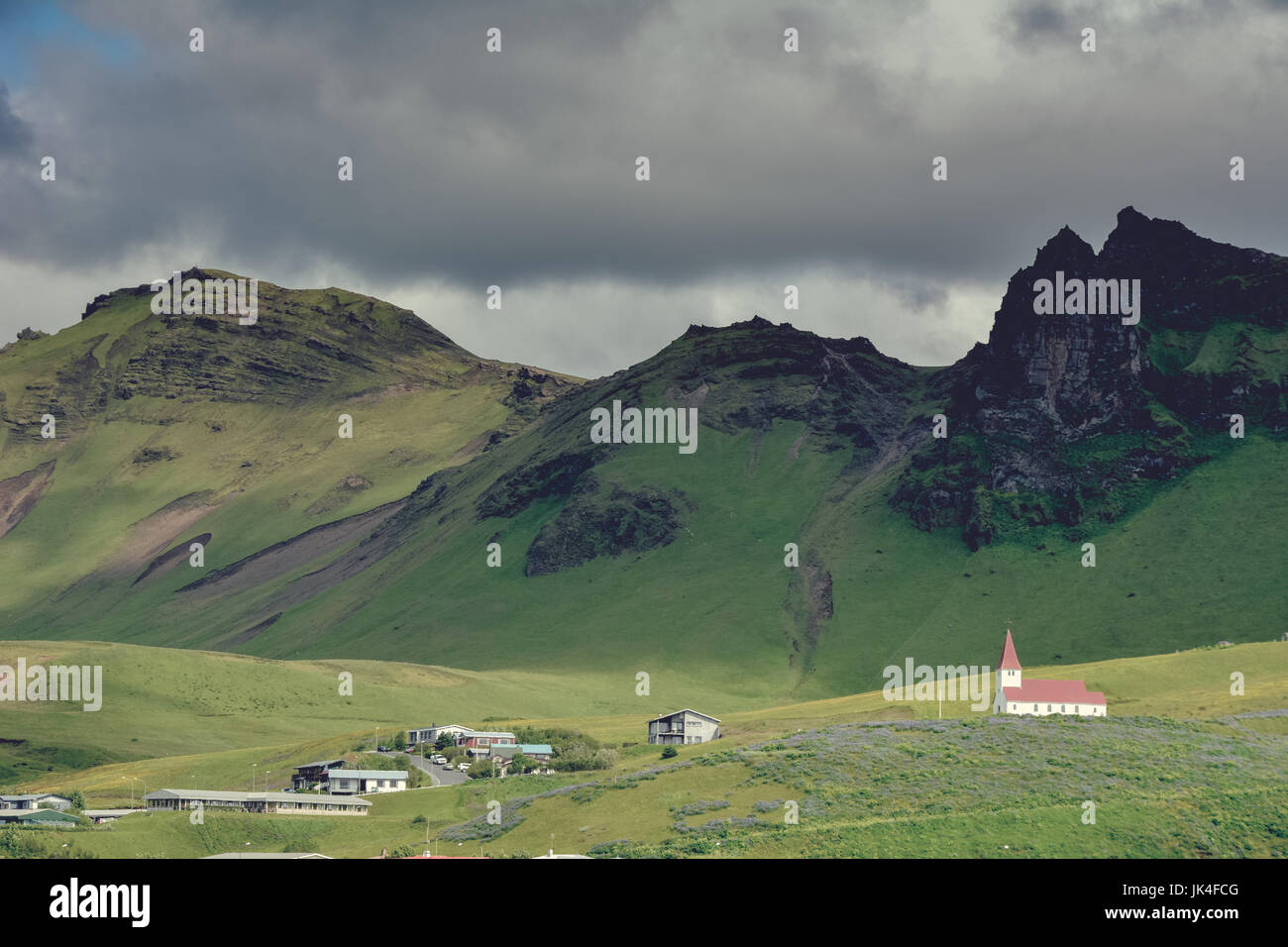 Landscape of Vik village, Iceland with Myrdal Church in background on ...