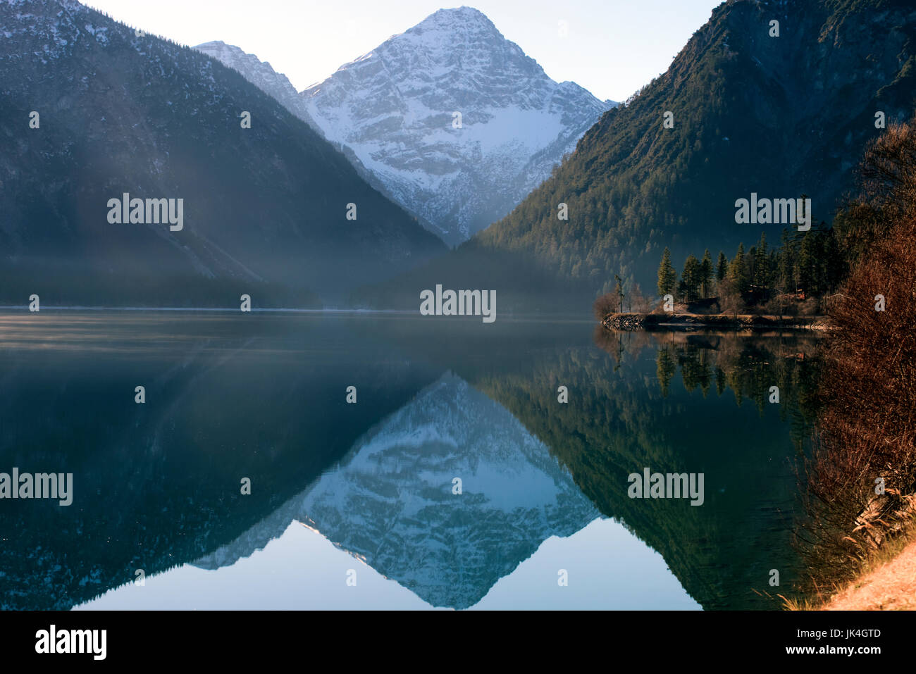 Winter lake reflection - Austria Stock Photo - Alamy