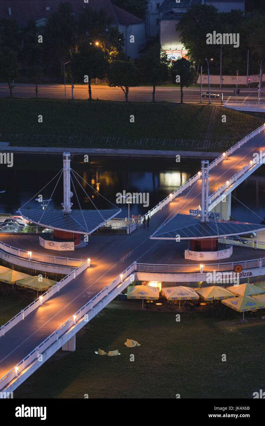 Lithuania, Vilnius, elevated view of Neris River footbridge, evening ...