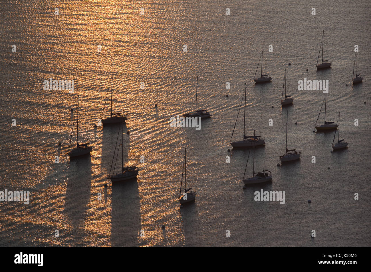 Boston harbor sunrise reflection with sailboats hi-res stock ...
