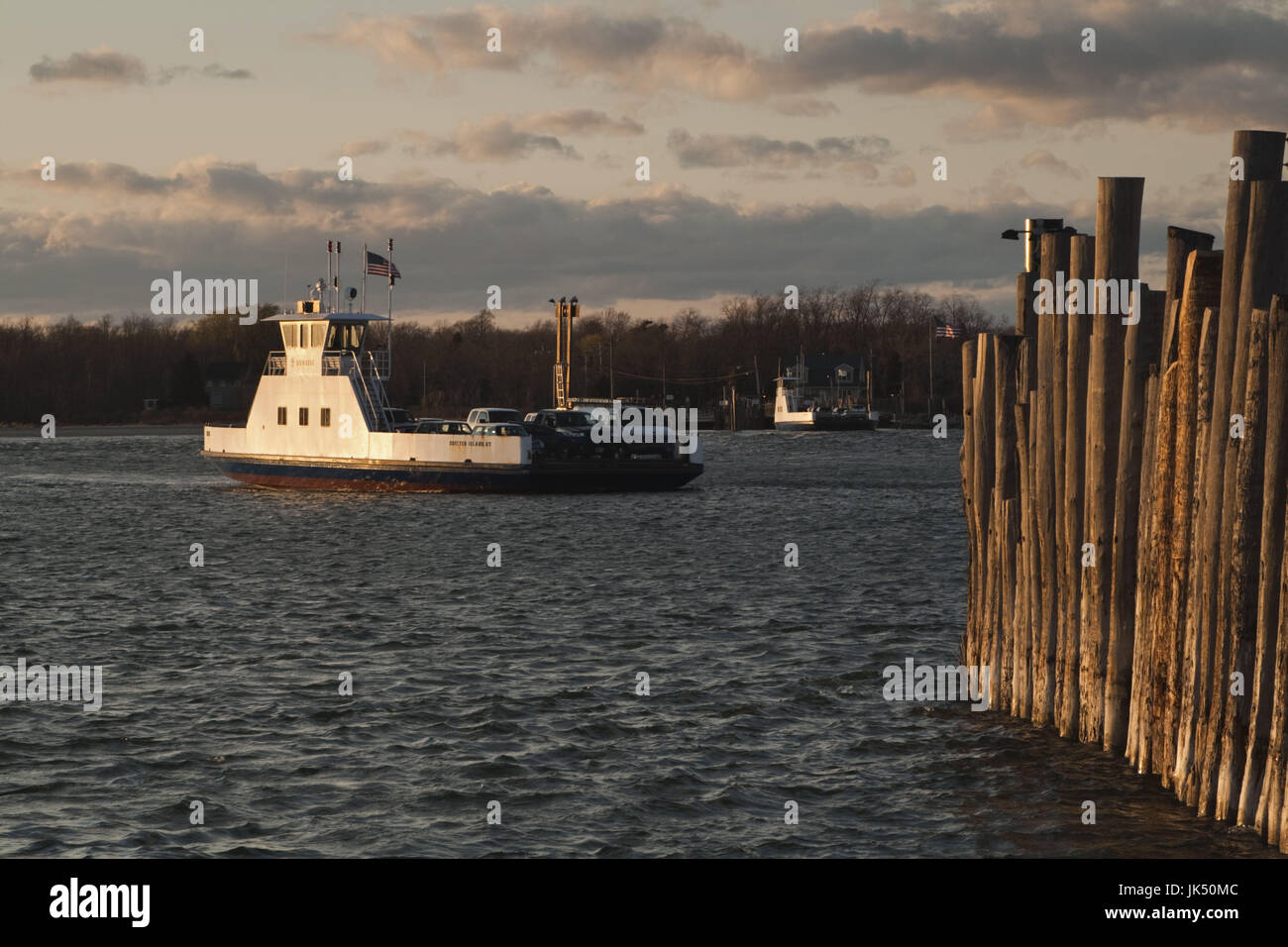 USA, New York, Long Island, North Haven, Shelter Island Ferry, sunset ...