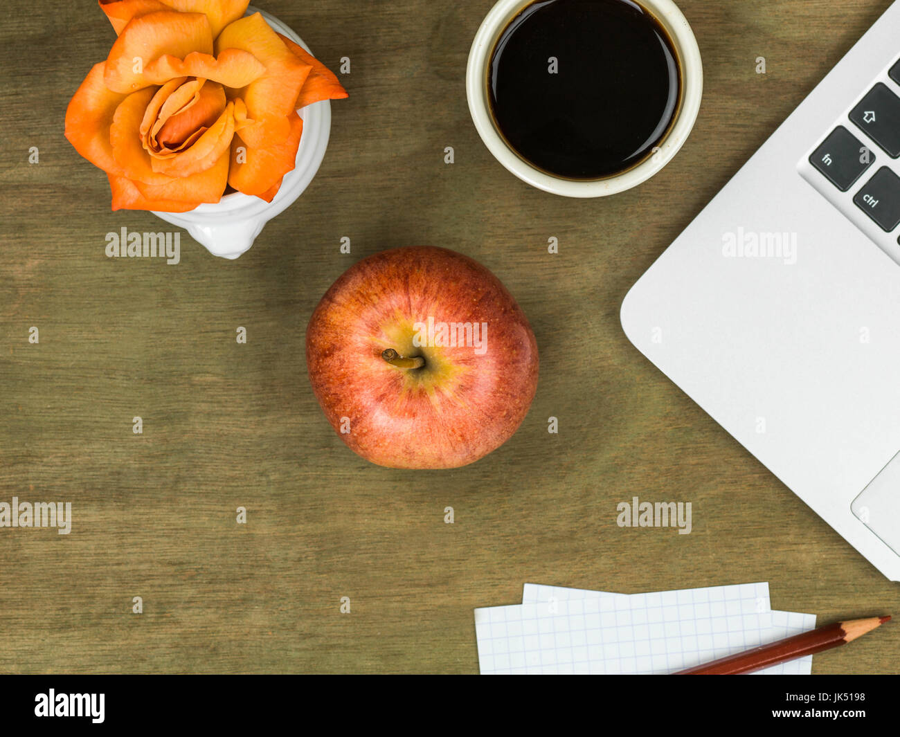 Computer Workstation with an Apple and a Cup of Black Coffee On A ...