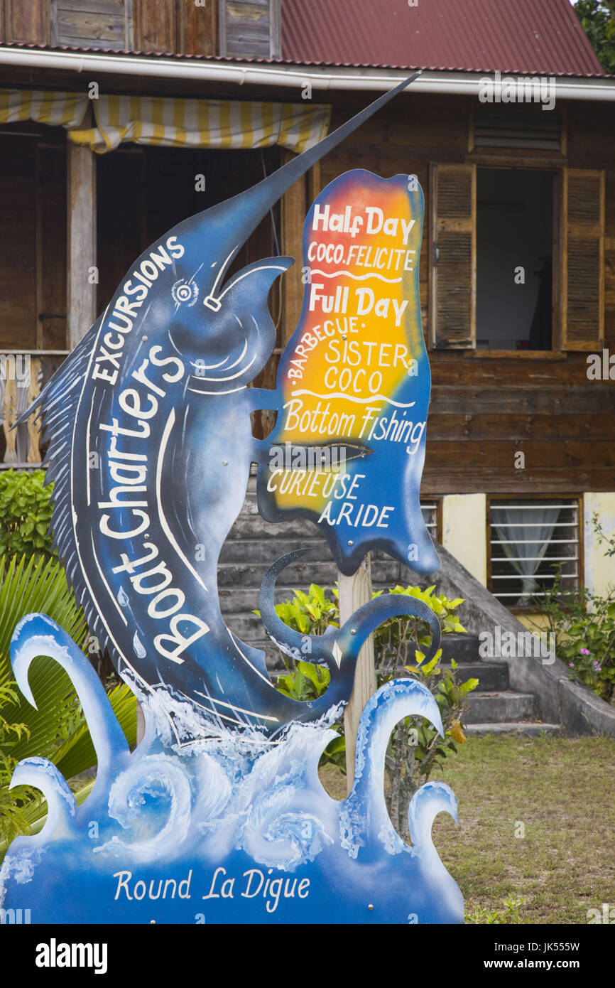 Seychelles, La Digue Island, La Passe, boat charter sign Stock Photo ...