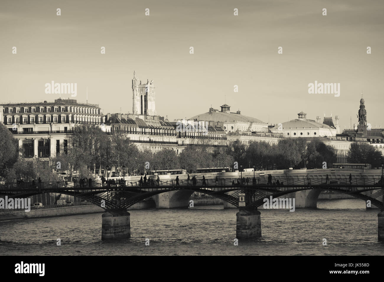 France, Paris, Pont des Arts bridge and Seine riverfront, sunset Stock ...