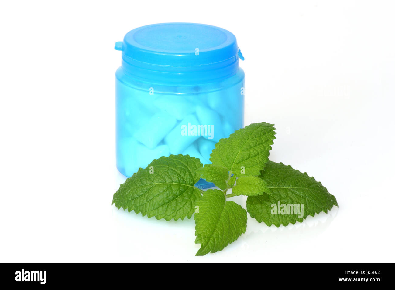 Peppermint chewing gum in beverage on white background Stock Photo - Alamy