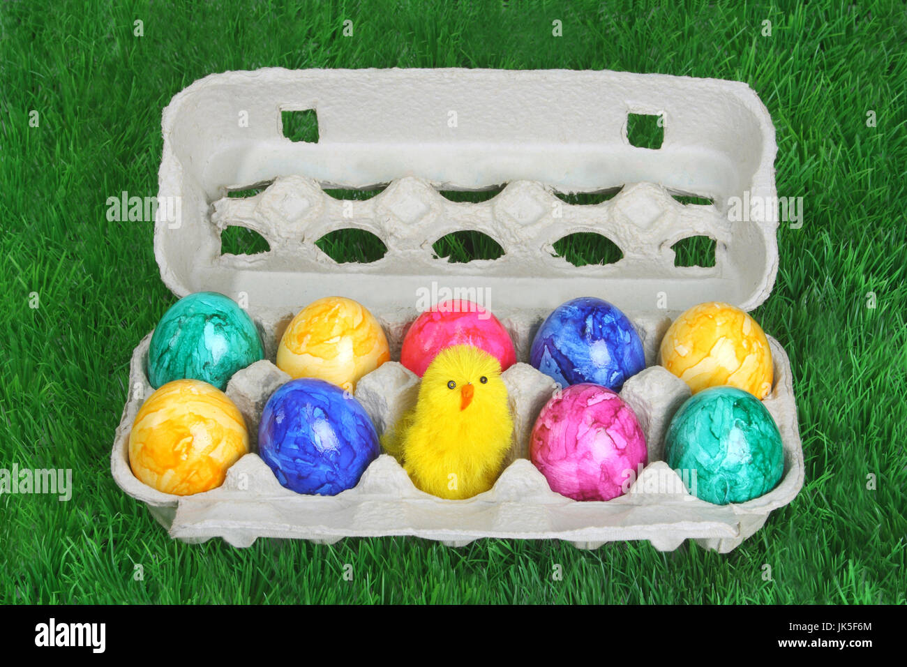 Colorful dyed easter eggs in a tray Stock Photo - Alamy