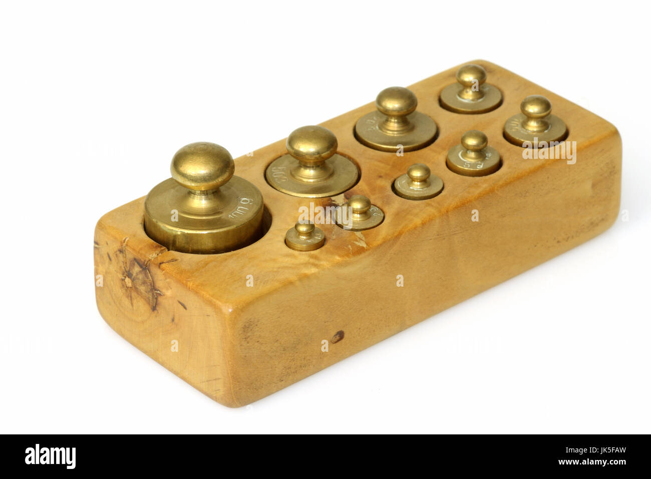 A set of lead weights isolated on whtie background Stock Photo - Alamy