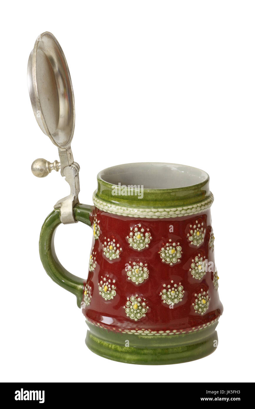 A traditional German beer jug with silver lid isolated on white ...