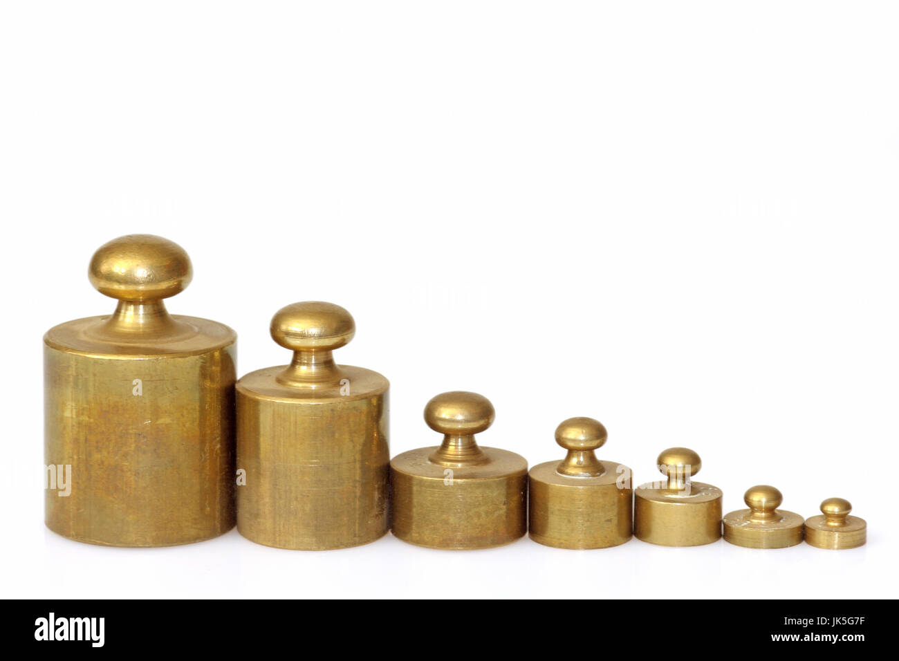A set of lead weights isolated on whtie background Stock Photo - Alamy