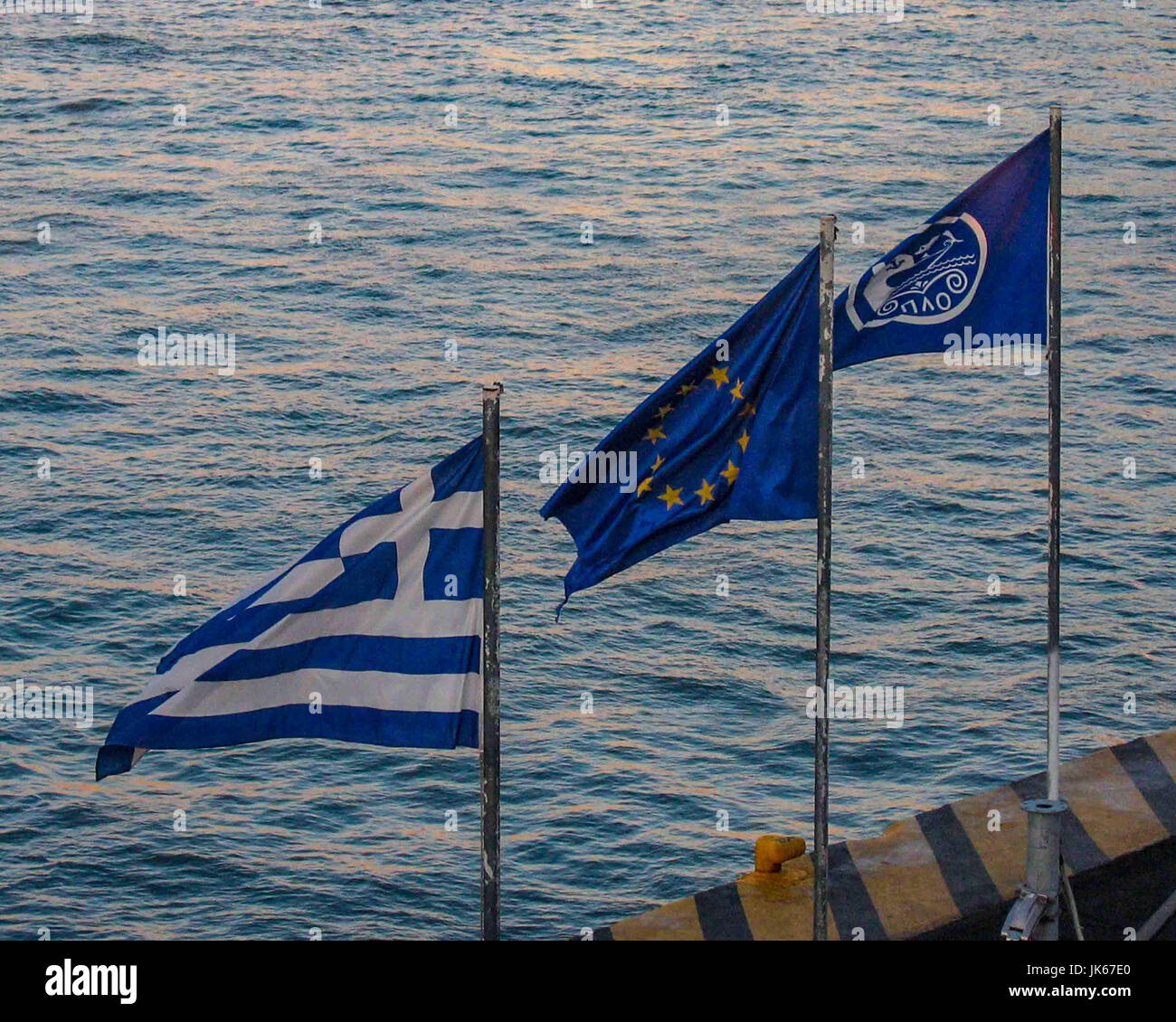 Piraeus, Greece. 30th Sep, 2004. In early morning light the flags of ...