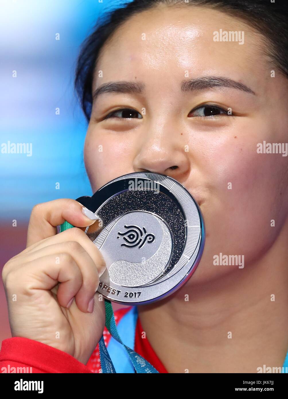 Budapest. 21st July, 2017. China's Wang Han kisses her medal during the ...