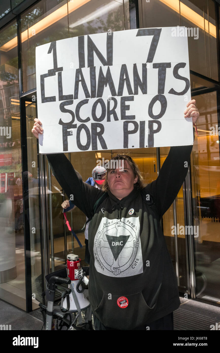 Disabled people protest against welfare cuts hi-res stock photography ...