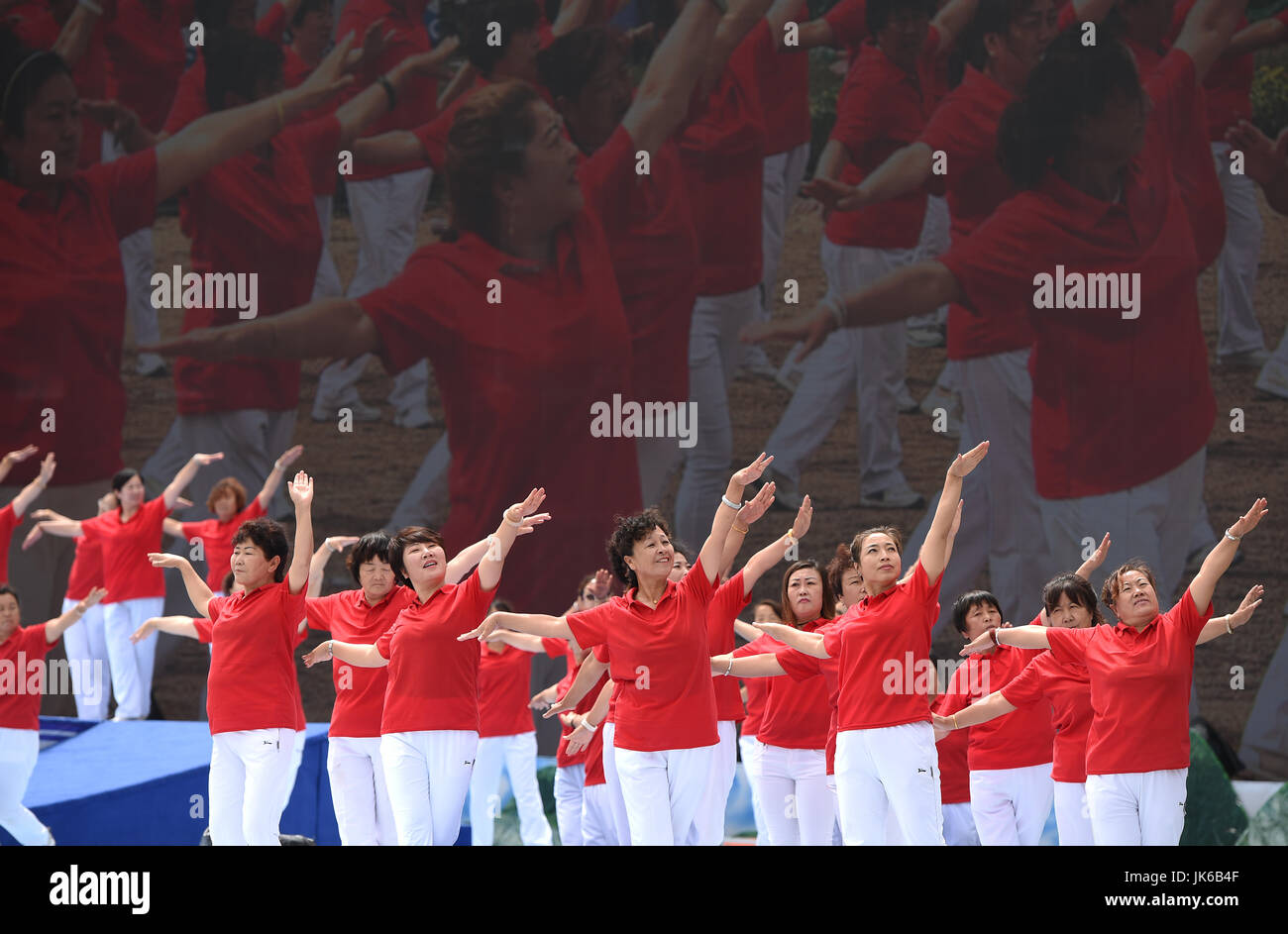 Inner Mongolia. 22nd July, 2017. Women dance during the opening of a ...