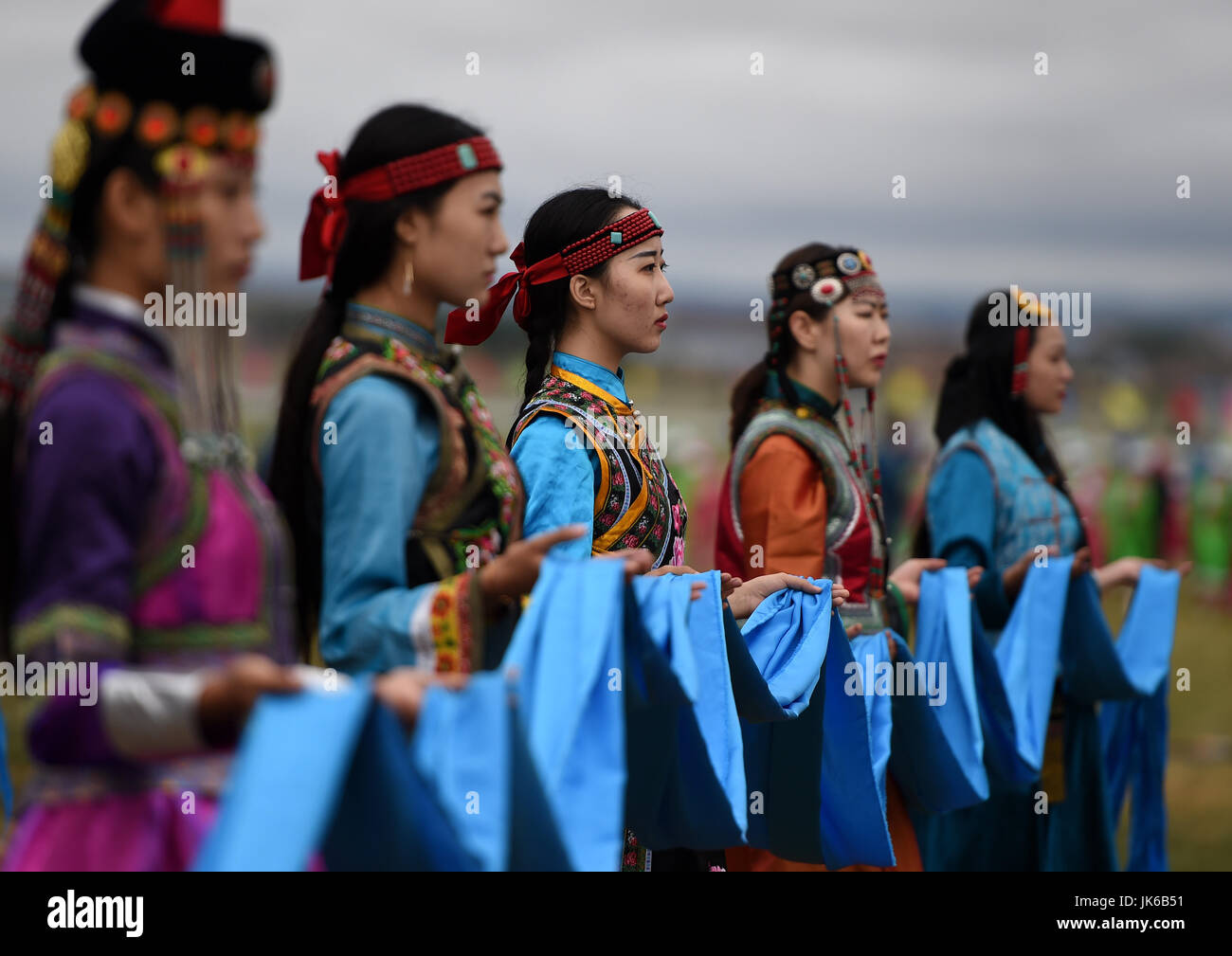 Inner Mongolia. 22nd July, 2017. Girls of Mongolian ethnic group hold ...