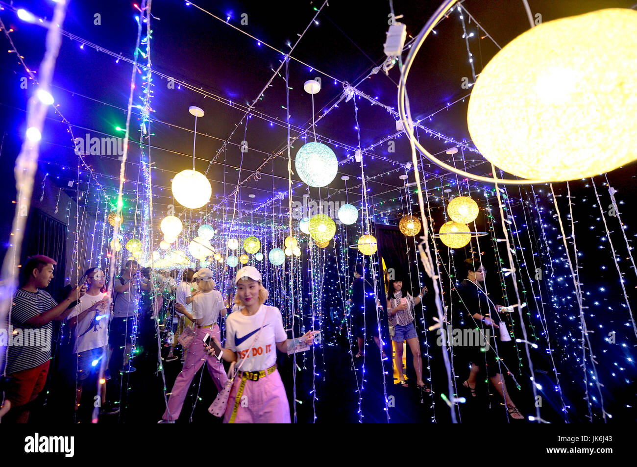 Tianjin, China. 22nd July, 2017. People pose for photo at the "Fantasy ...