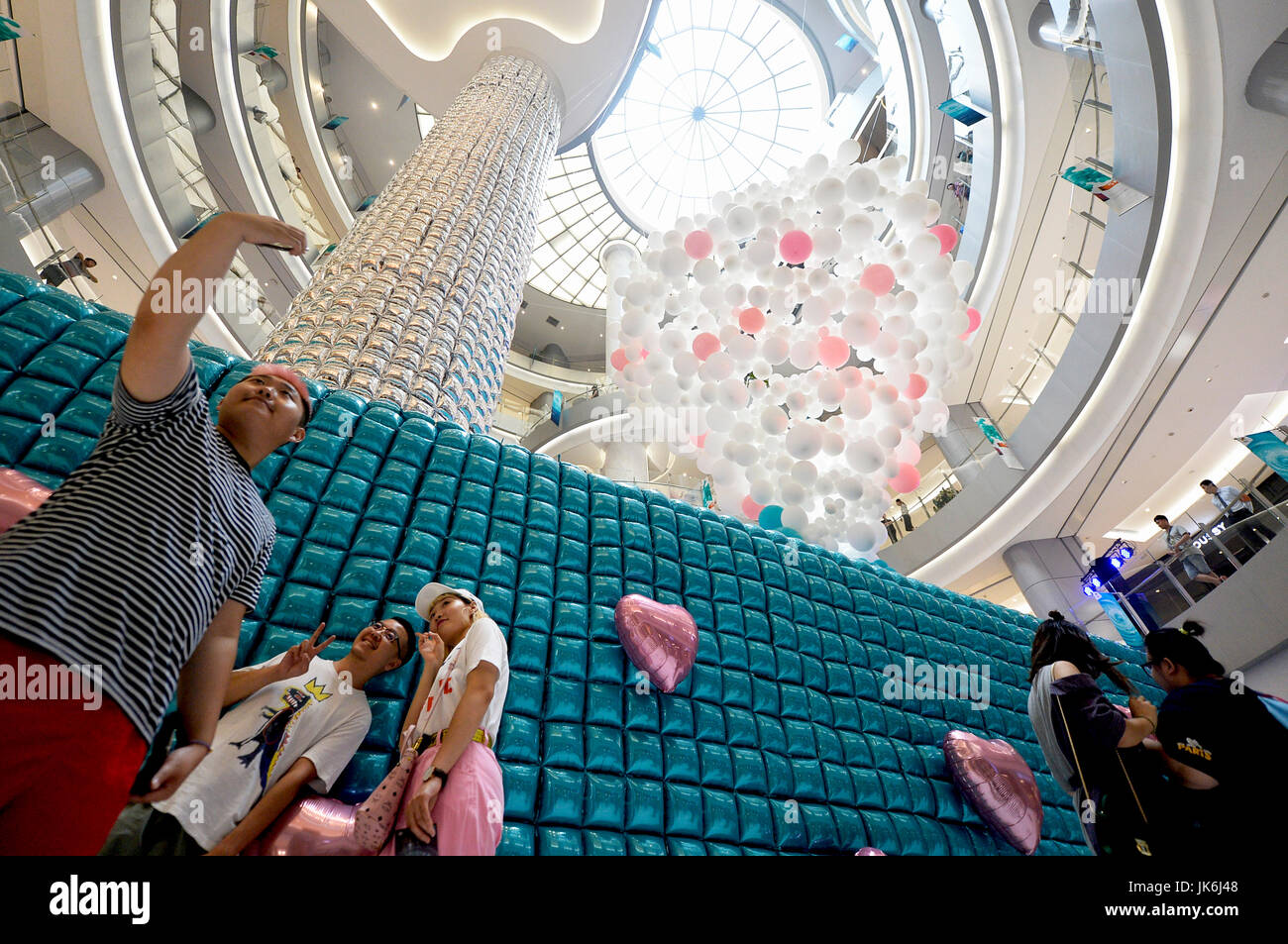 Tianjin, China. 22nd July, 2017. People take selfies at the "Fantasy ...