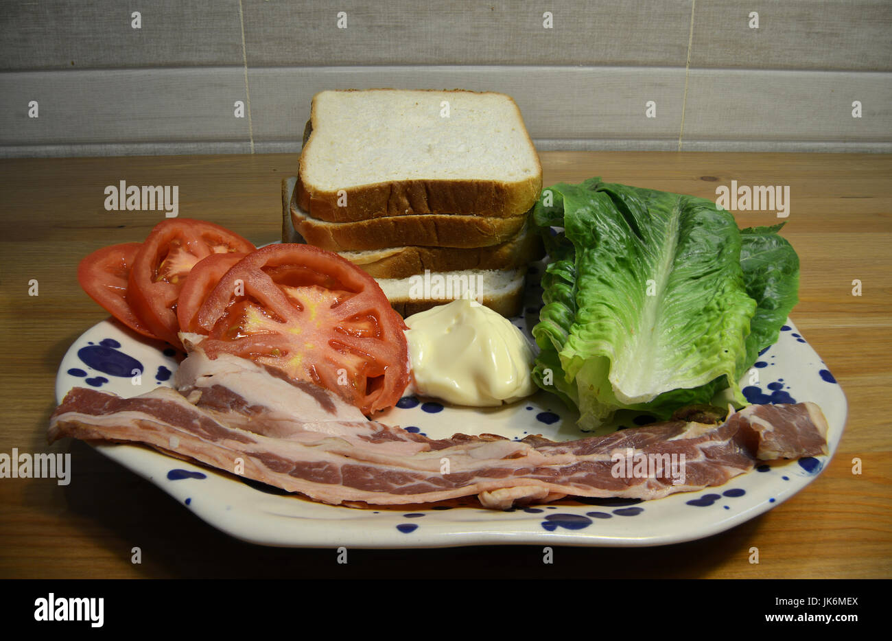 BLT ingredients bacon , lettuce and tomato Stock Photo - Alamy