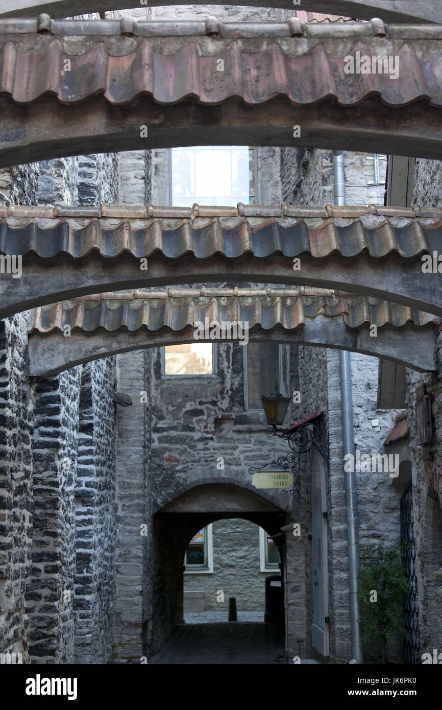 Estonia, Tallinn, Old Town, stone passageway by town walls Stock Photo ...