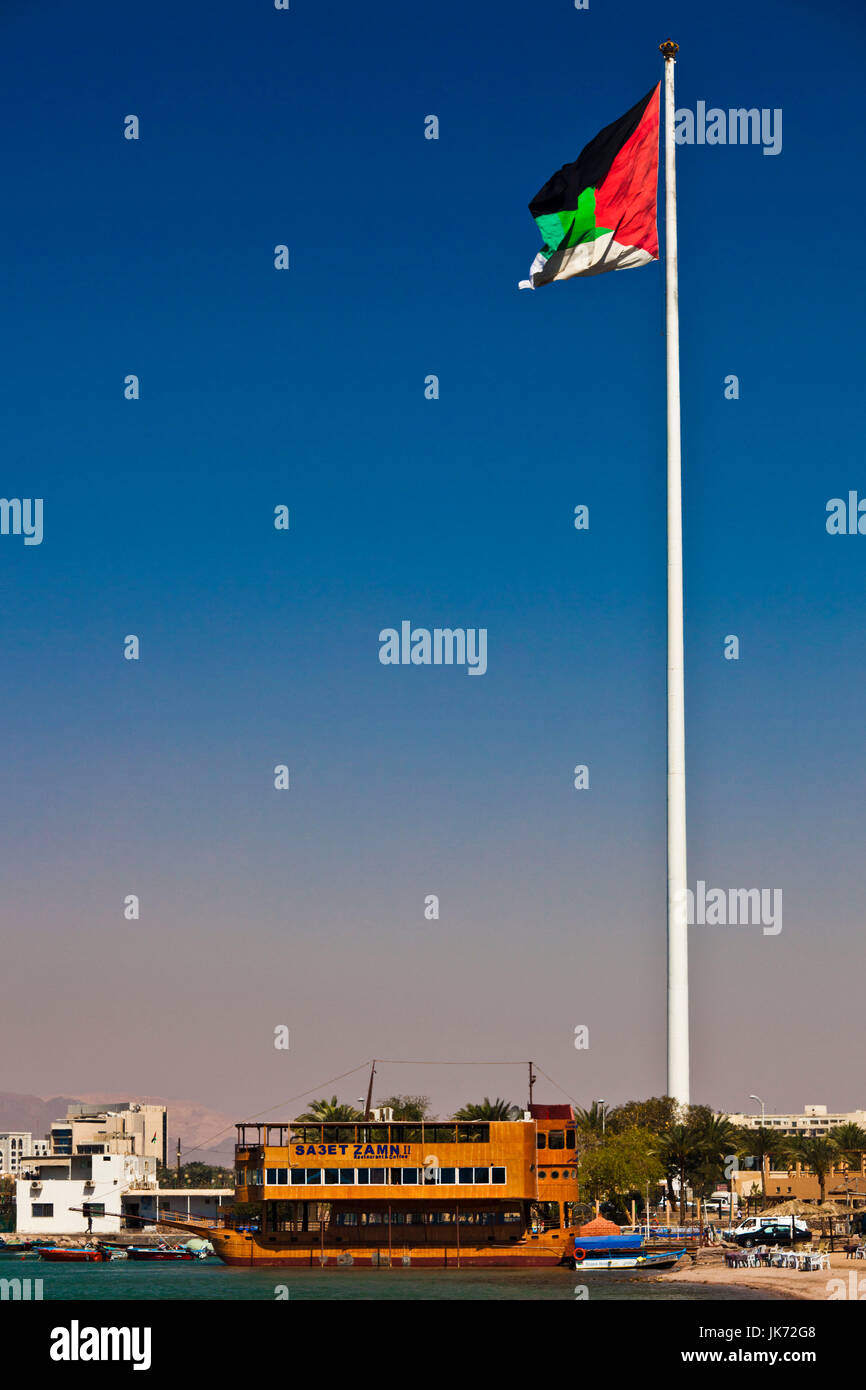 Jordan, Aqaba, Aqaba flagpole and floating restaurant Stock Photo - Alamy