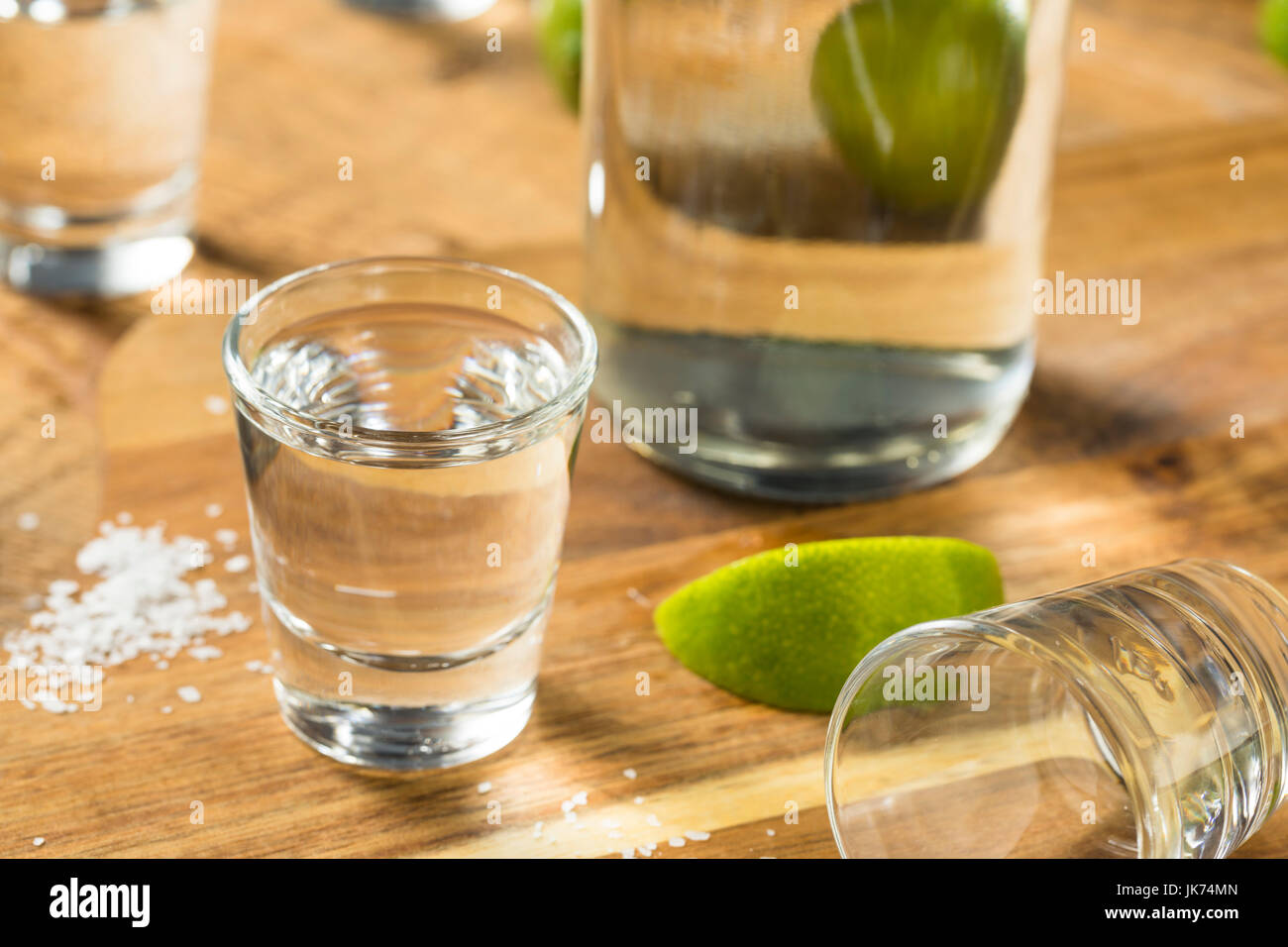 Alcohol Mezcal Tequila Shots with Lime and Salt Stock Photo - Alamy