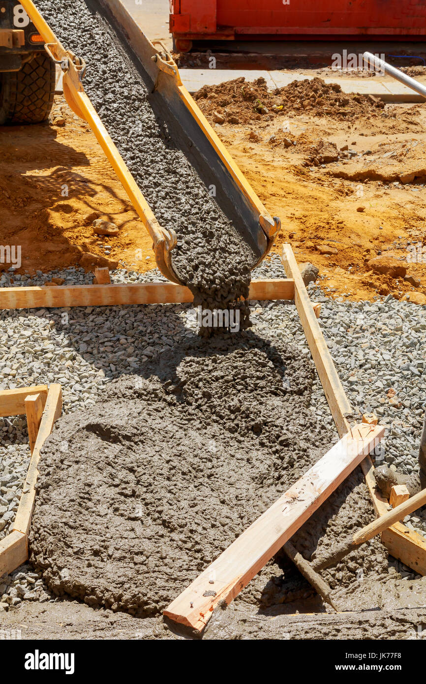 Pouring cement concrete process to apartment building Stock Photo - Alamy