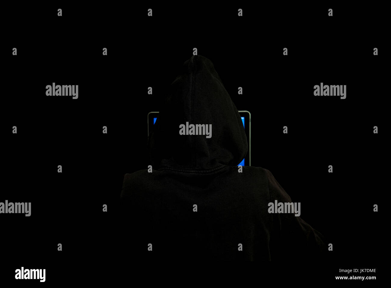 Anonymous Person behind Laptop computer with black background Stock ...