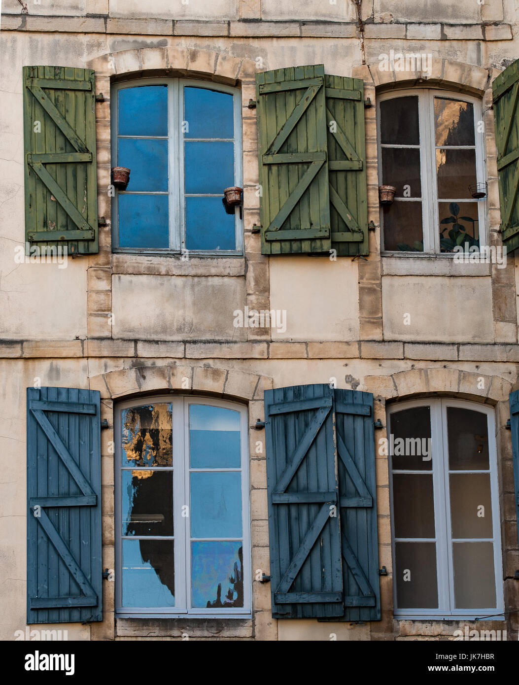 Typical french windows with colorful shutters Stock Photo - Alamy