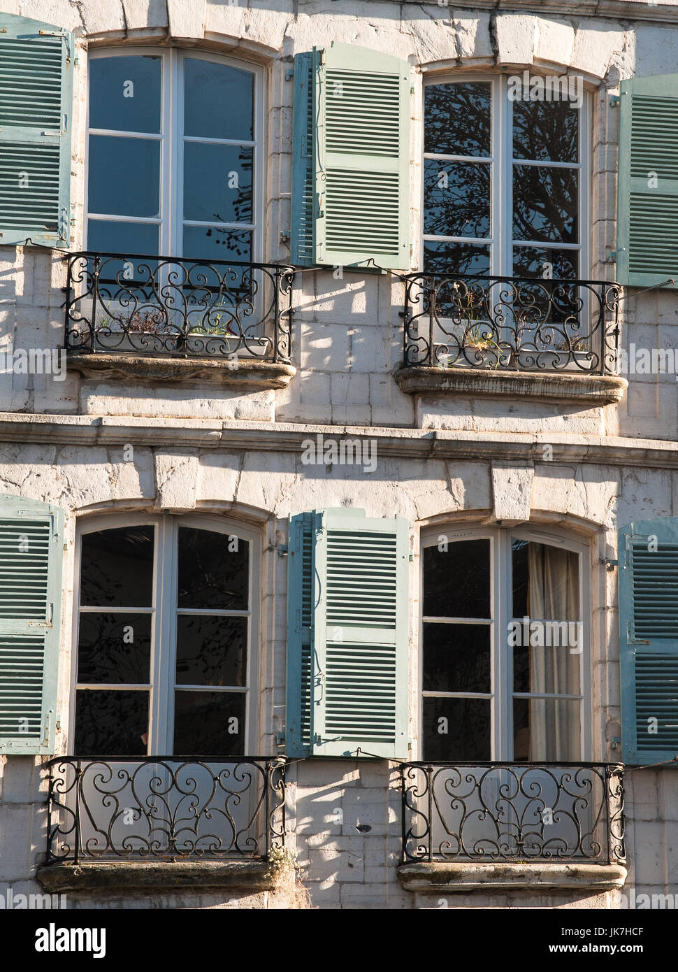 Typical french windows with colorful shutters Stock Photo - Alamy