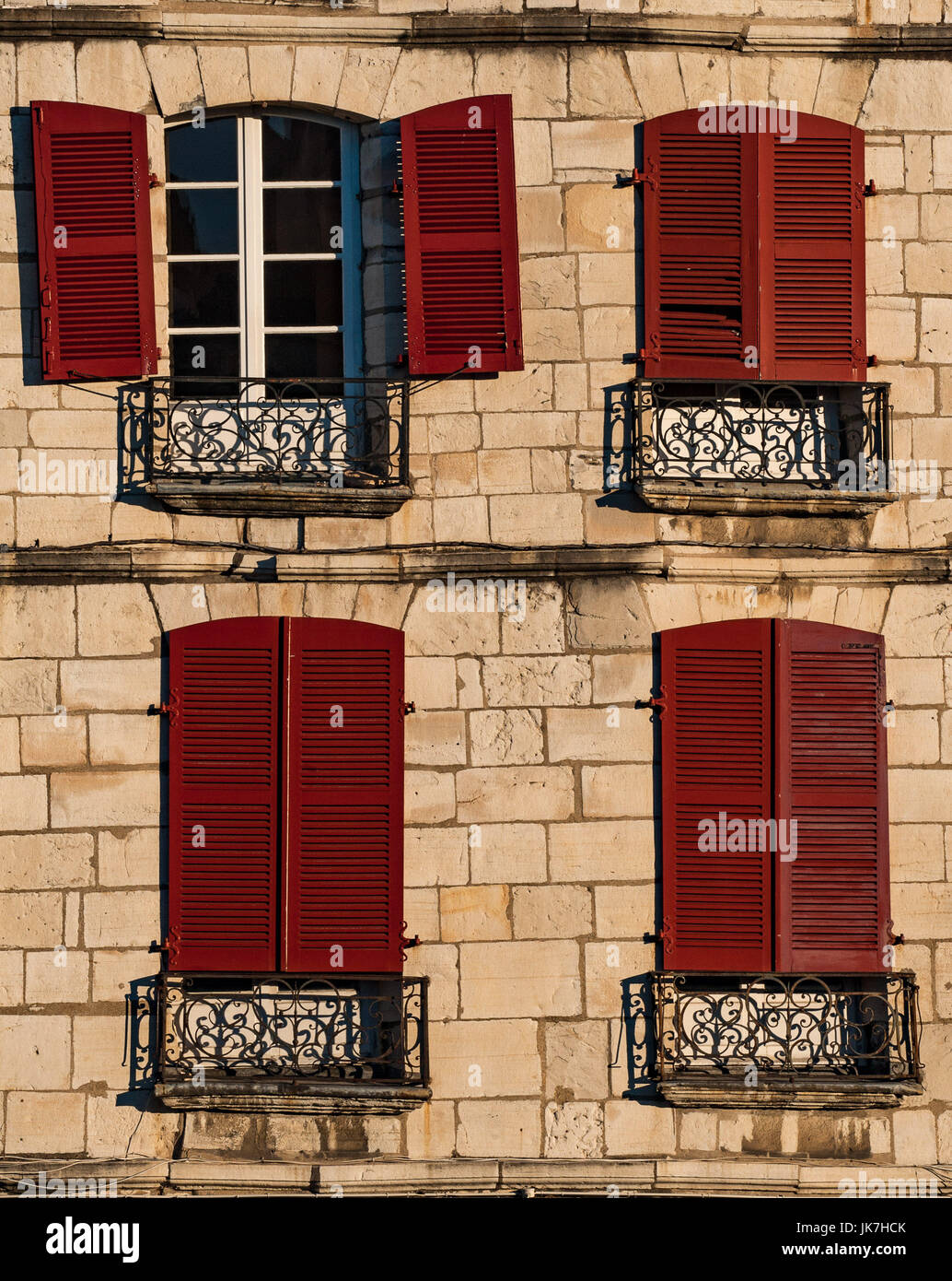 Typical french windows with colorful shutters Stock Photo - Alamy