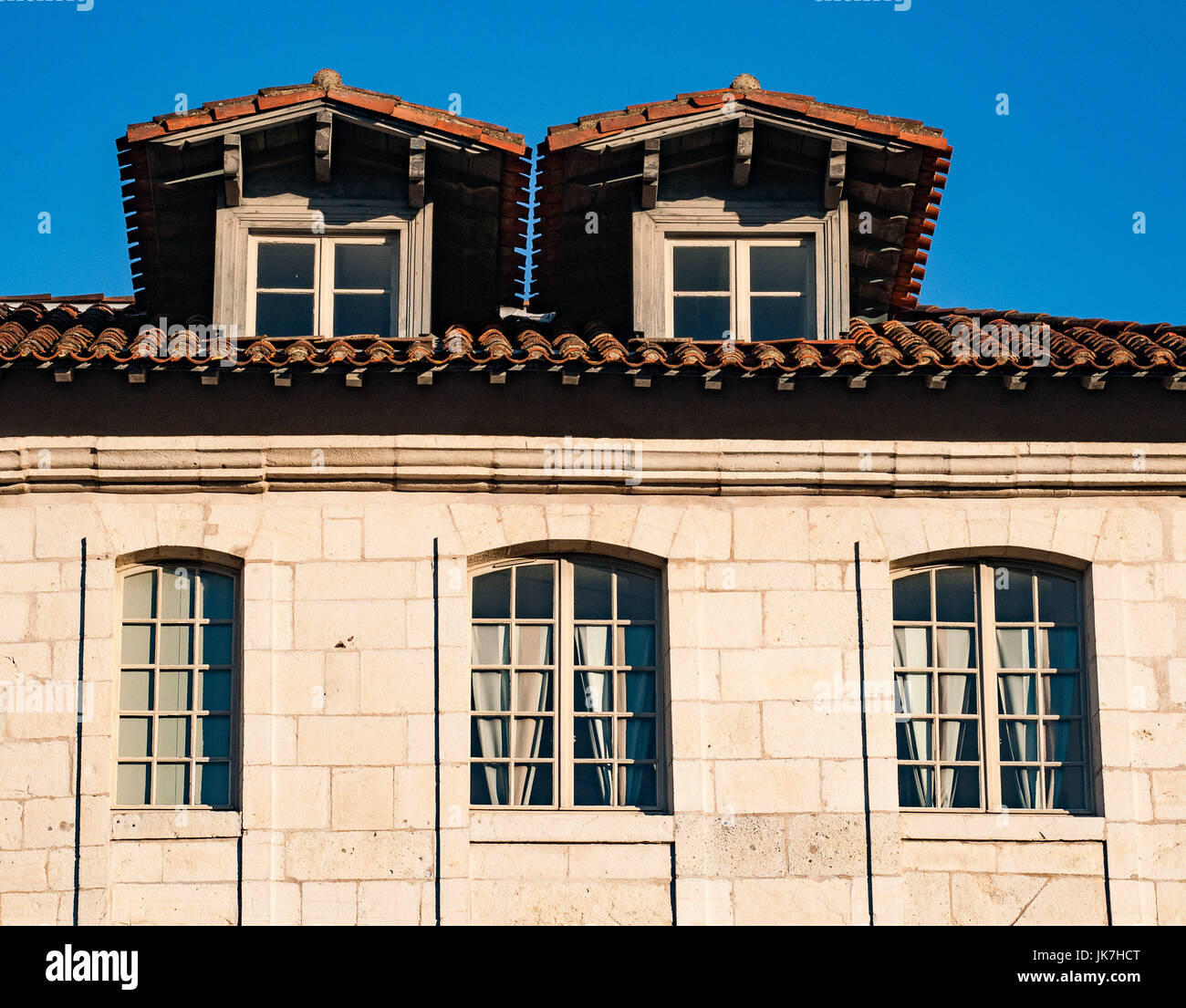 Typical french windows with colorful shutters Stock Photo - Alamy