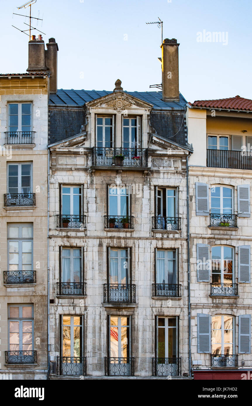 Typical french windows with colorful shutters Stock Photo - Alamy