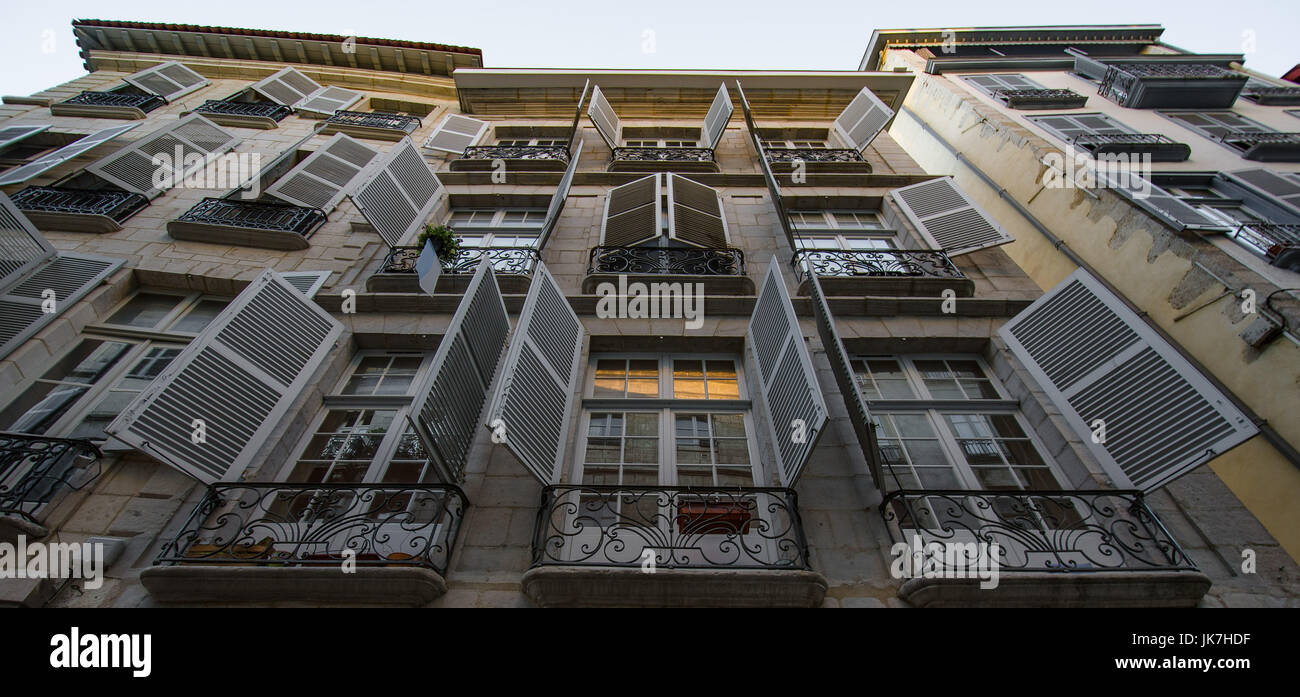 Typical french windows with colorful shutters Stock Photo - Alamy
